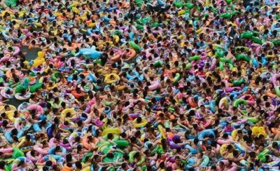 Most Crowded Swimming Pool In The World - Can You See The Water?